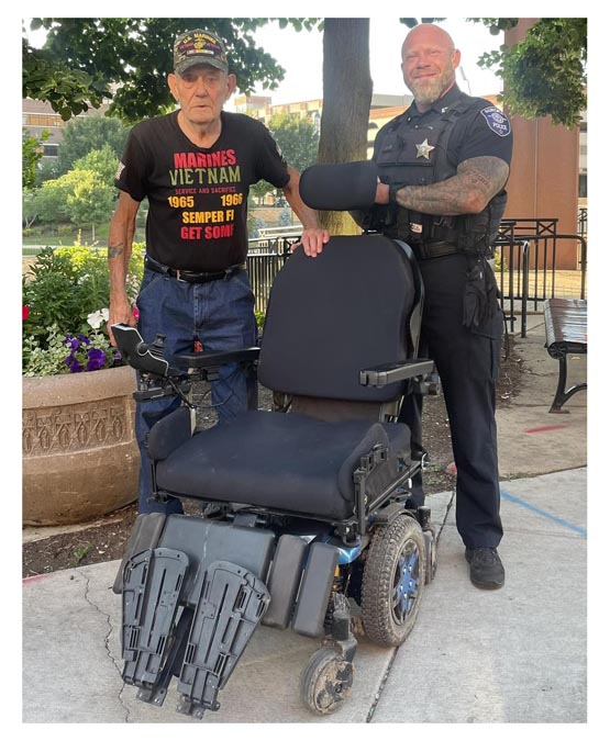 Aurora officials help senior veteran John Krebs with chair – The Voice